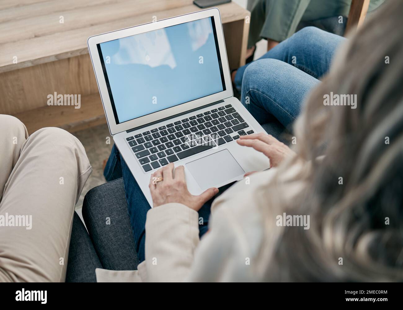 Green screen, laptop and hands of woman typing in office workplace ...