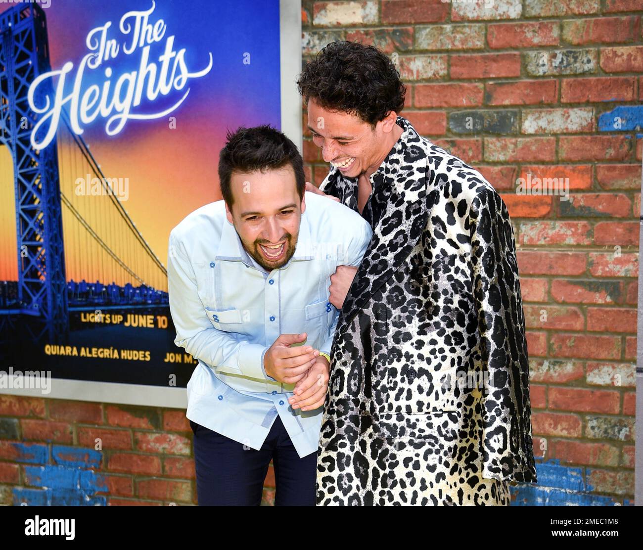Producer Lin-Manuel Miranda, left, and actor Anthony Ramos laugh while ...
