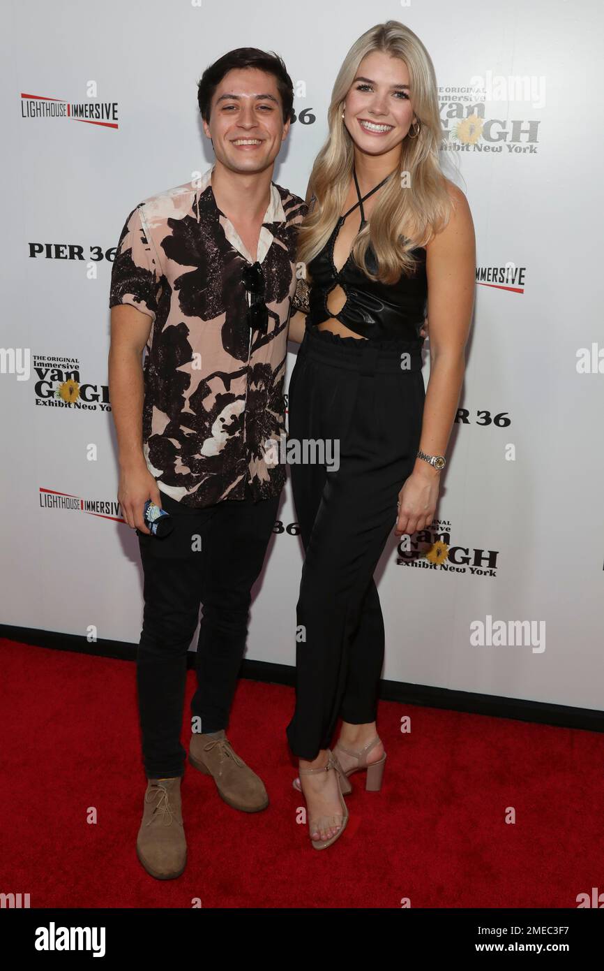 Josh Strobl, left, and Zan Berube, right, attend the "Immersive Van ...