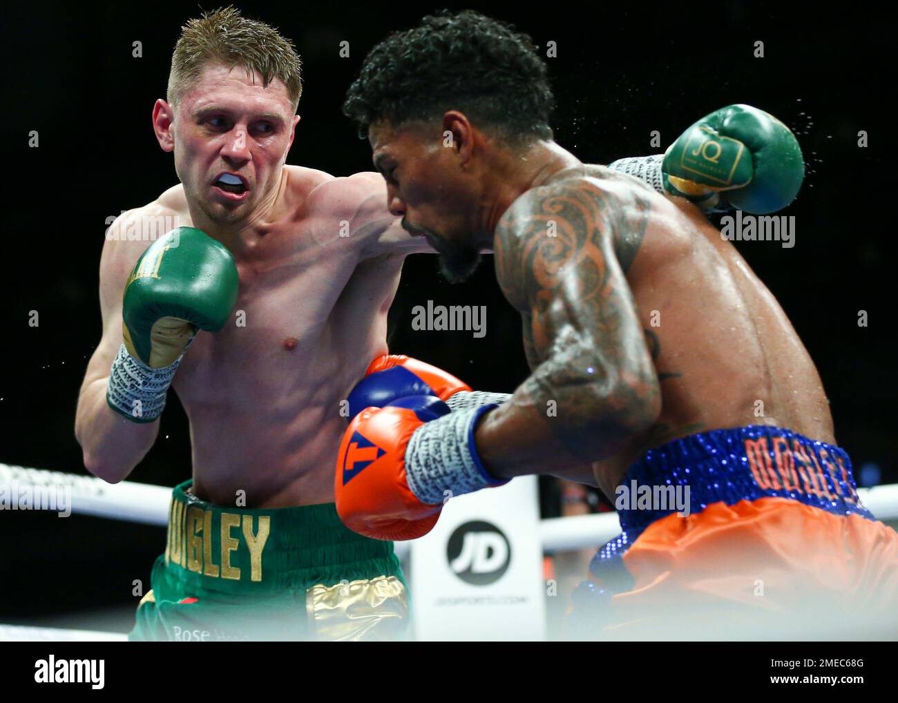Jason Quigley, left, fights Shane Mosley Jr. during their middleweight ...