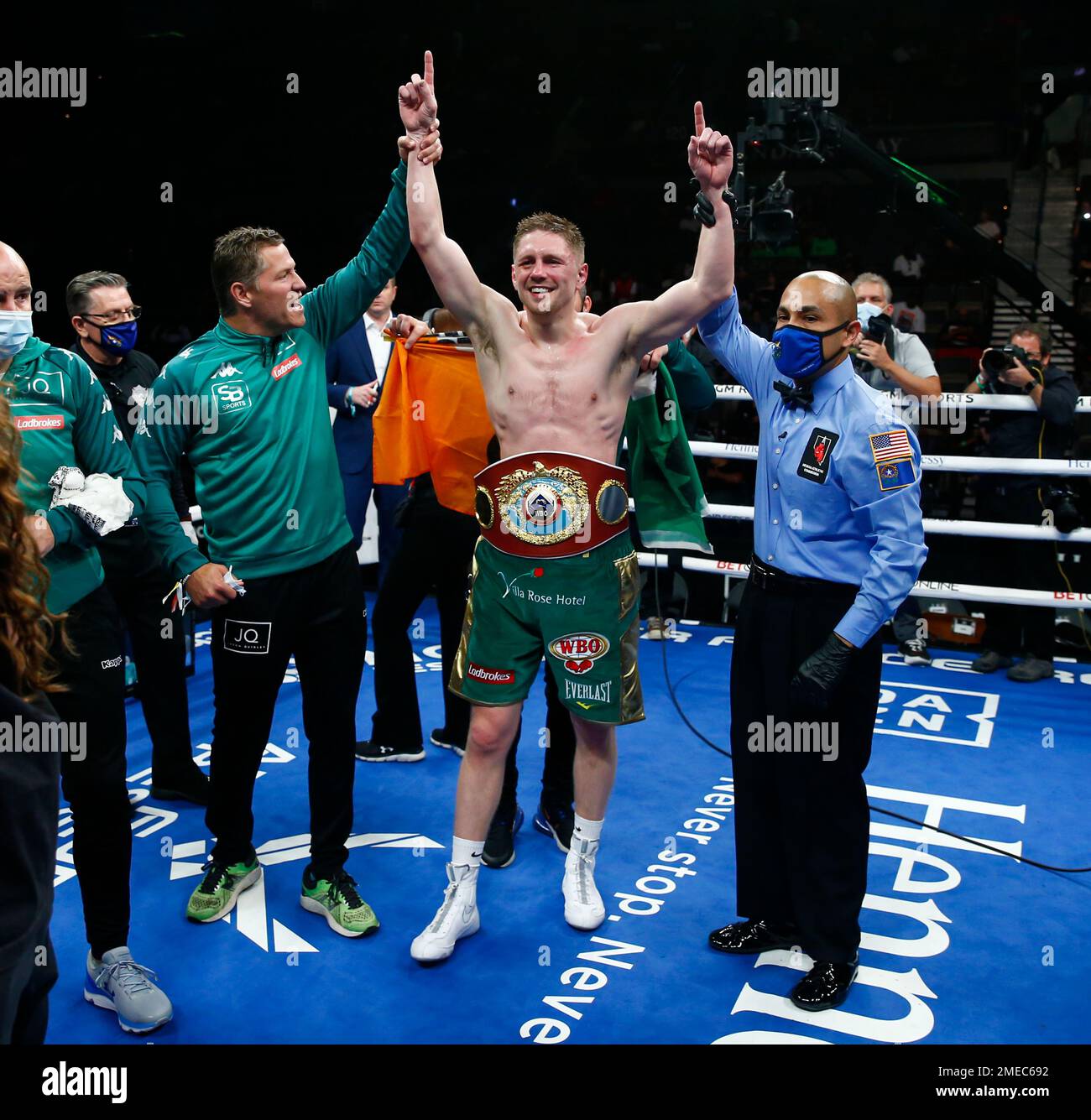 Jason Quigley celebrates after defeating Shane Mosley Jr., not pictured ...