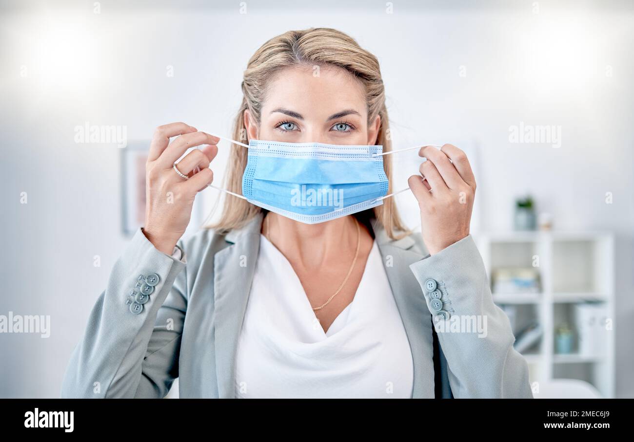 Woman, office portrait and put on mask for covid 19 safety, health and ...