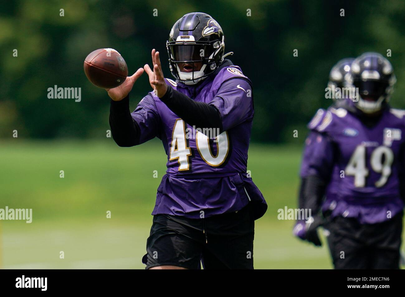 Baltimore Ravens linebacker Malik Harrison works out during the team's ...