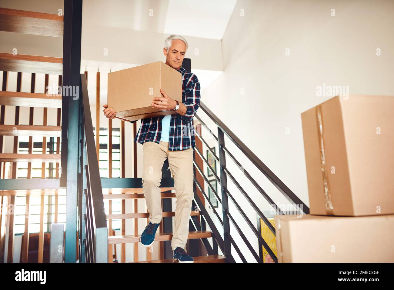 Moving days running like a well oiled machine. a handsome mature man ...
