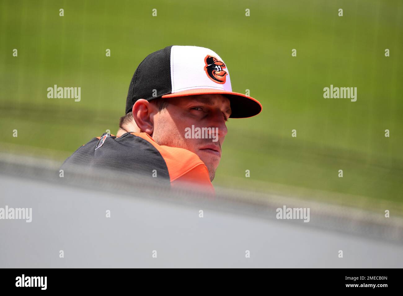 Baltimore Orioles' John Means looks on from the dugout during a ...