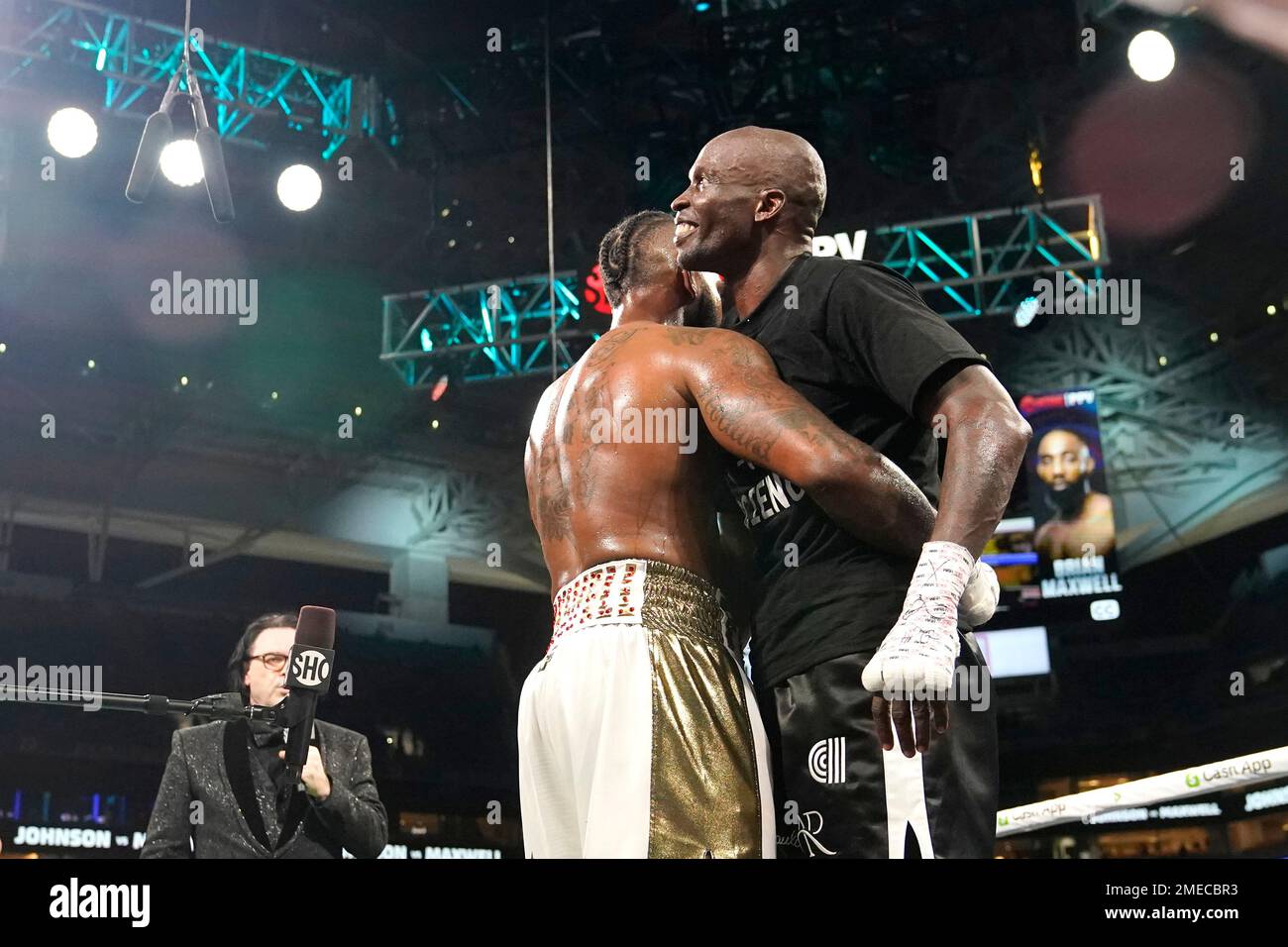 Brian Maxwell, left, and former NFL wide receiver Chad Johnson, right ...