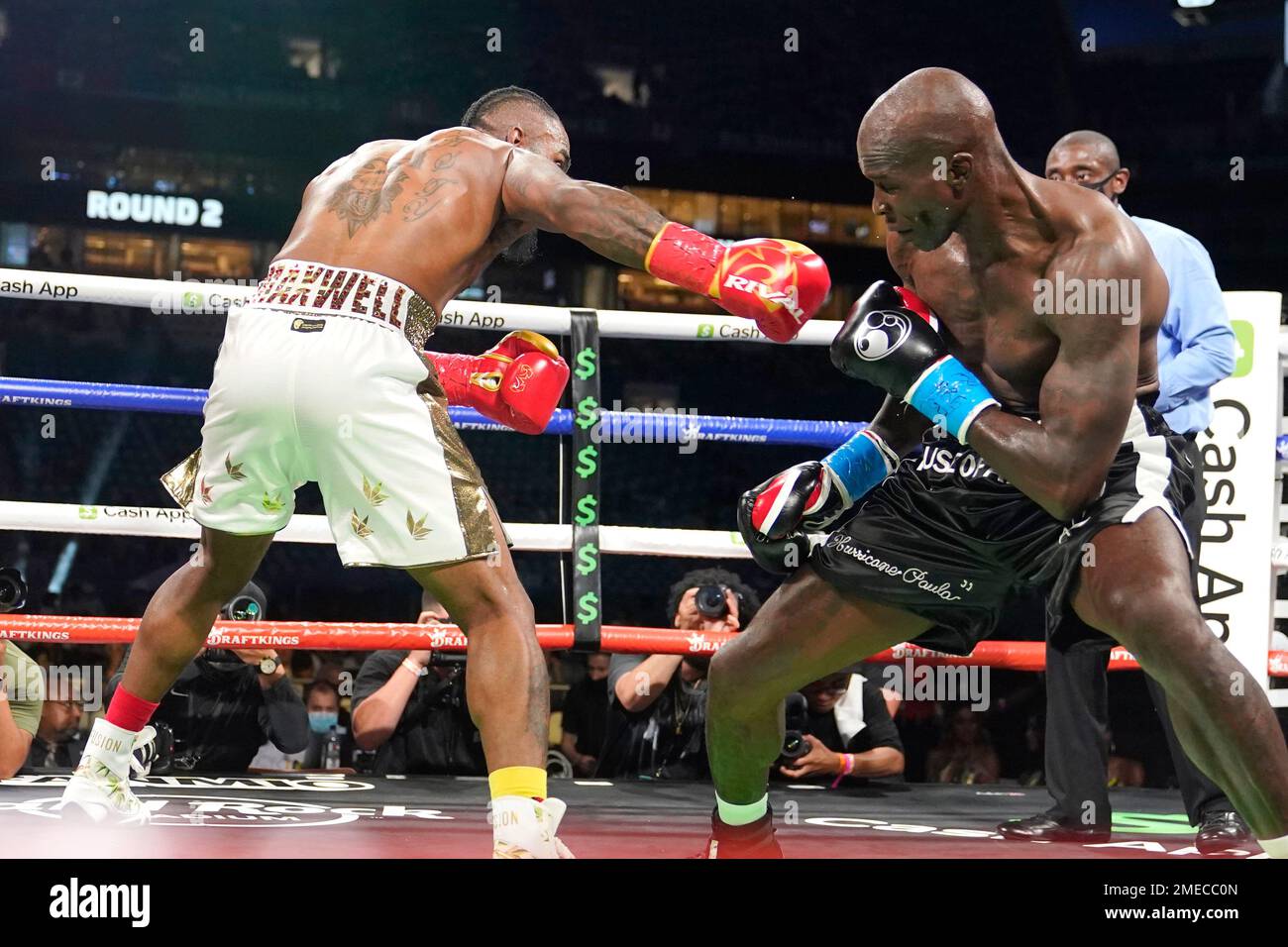Brian Maxwell, left, and Former NFL wide receiver Chad Johnson, right ...