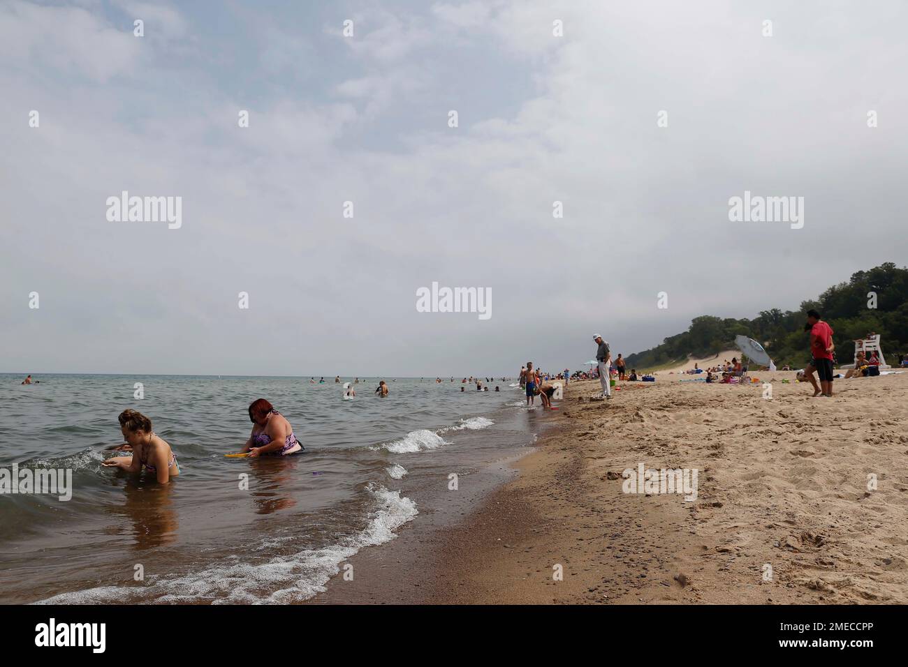 FILE - In this Aug. 10, 2015, photo, visitors relax at The Dunes State ...