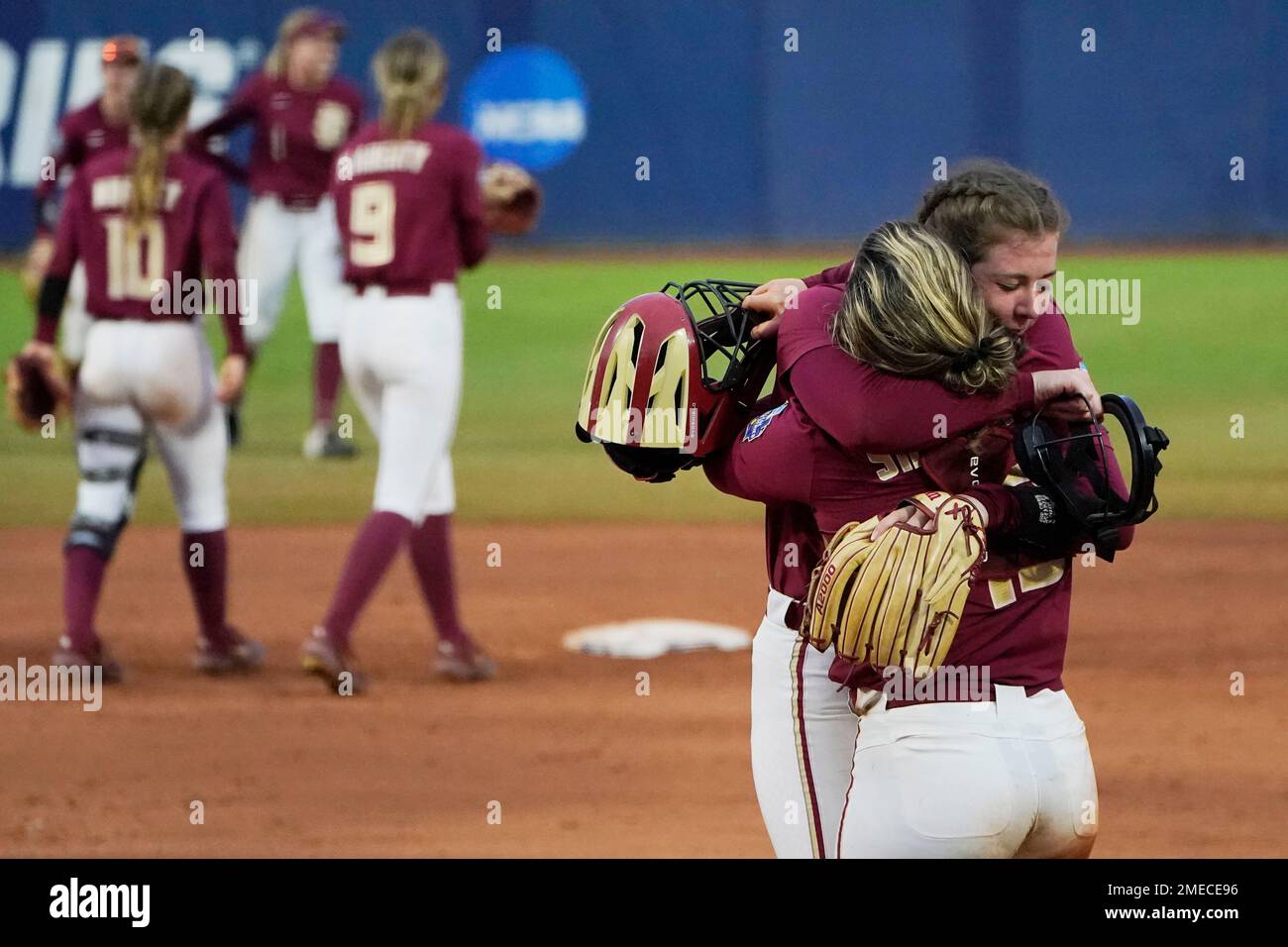 Florida State pitcher Kathryn Sandercock, right, celebrates with ...