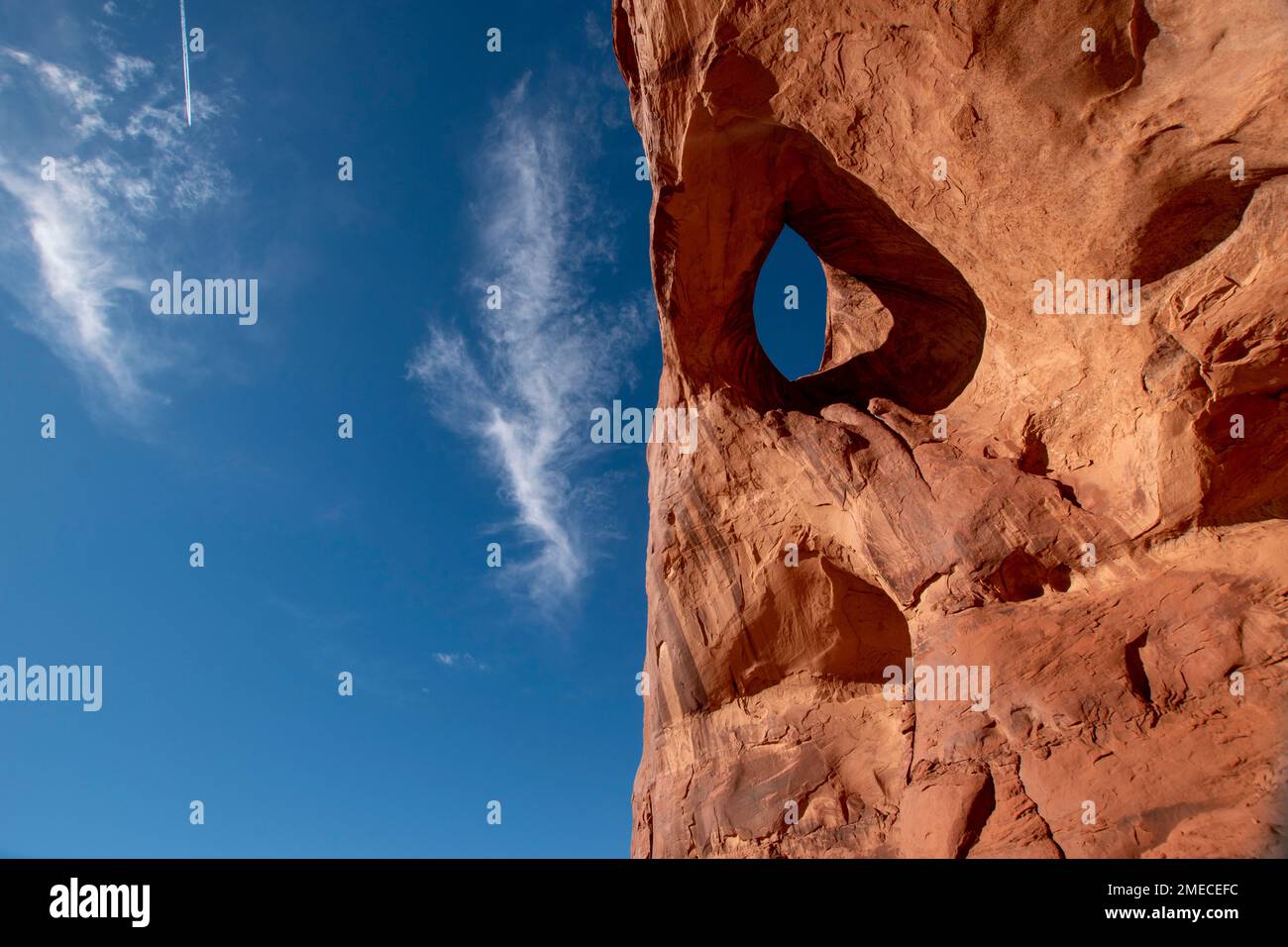 Sun's Eye is one of the natural stone arches in Monument Valley, AZ ...