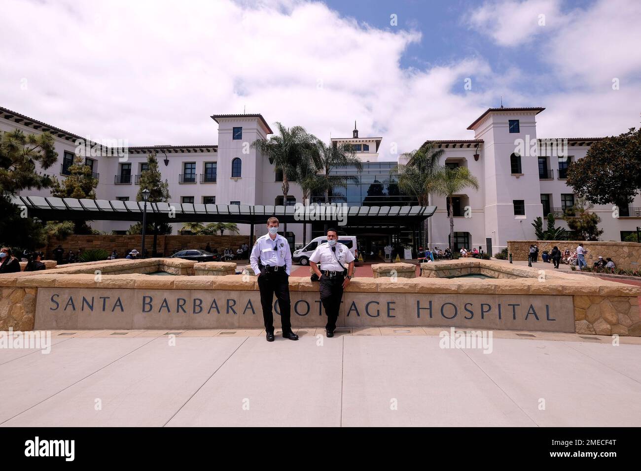 Security guards stand outside the Santa Barbara Cottage Hospital ...
