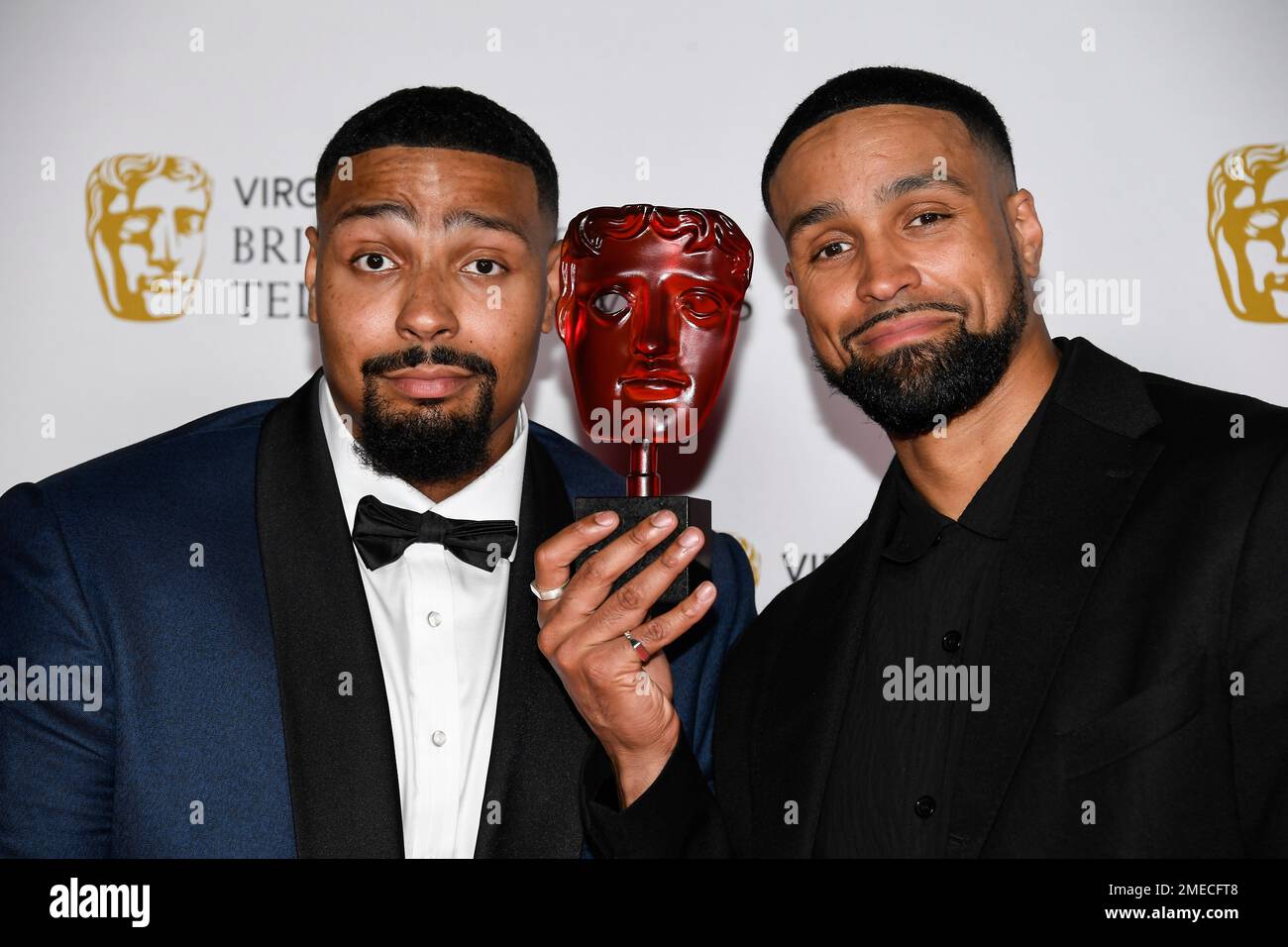 Jordan Banjo, left, and Ashley Banjo pose for photographers with their ...