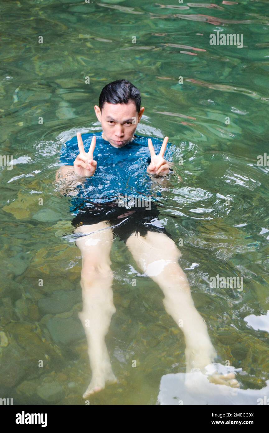 Swimming, Playing In The Water And Enjoying The Natural Beauty Of The ...