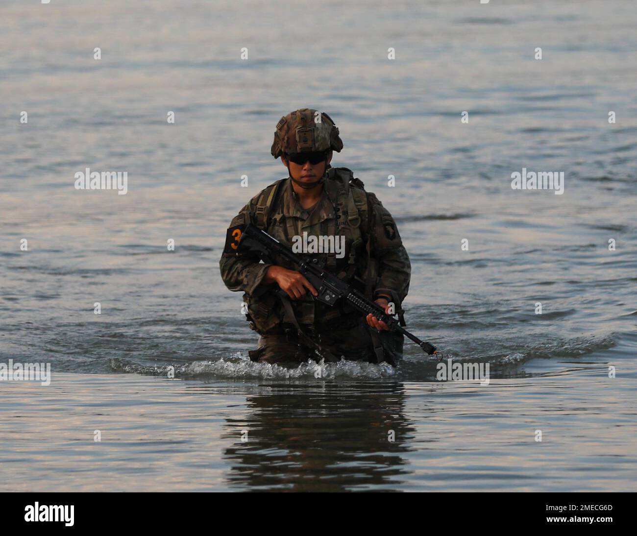 Specialist Liam Lee from 2nd Brigade Combat Team “Strike”, 101st Airborne Division (Air Assault ...