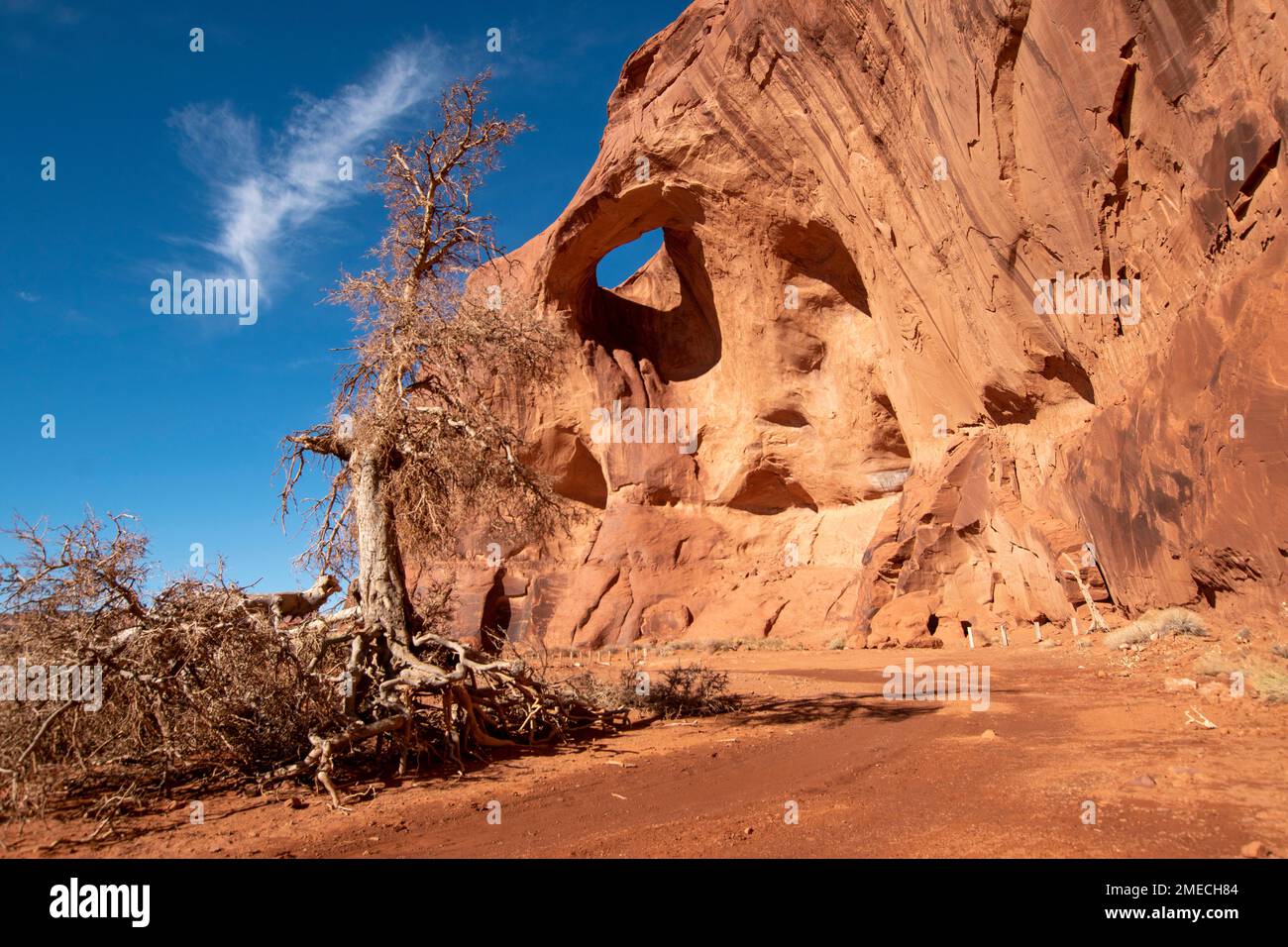 Sun's Eye is one of the natural stone arches in Monument Valley, AZ ...