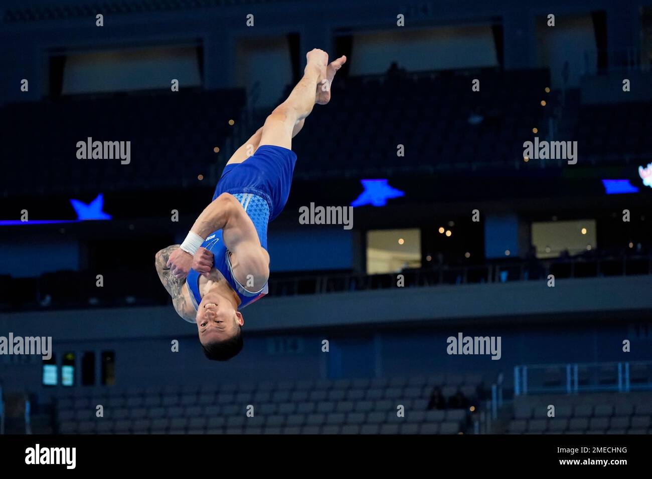Timothy Wang competes in the floor exercise during the U.S. Gymnastics ...