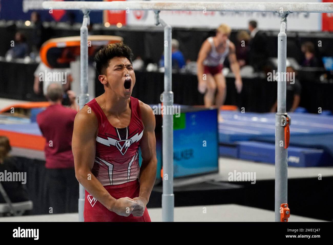 Yul Moldauer celebrates after his parallel bars routine during the U.S ...