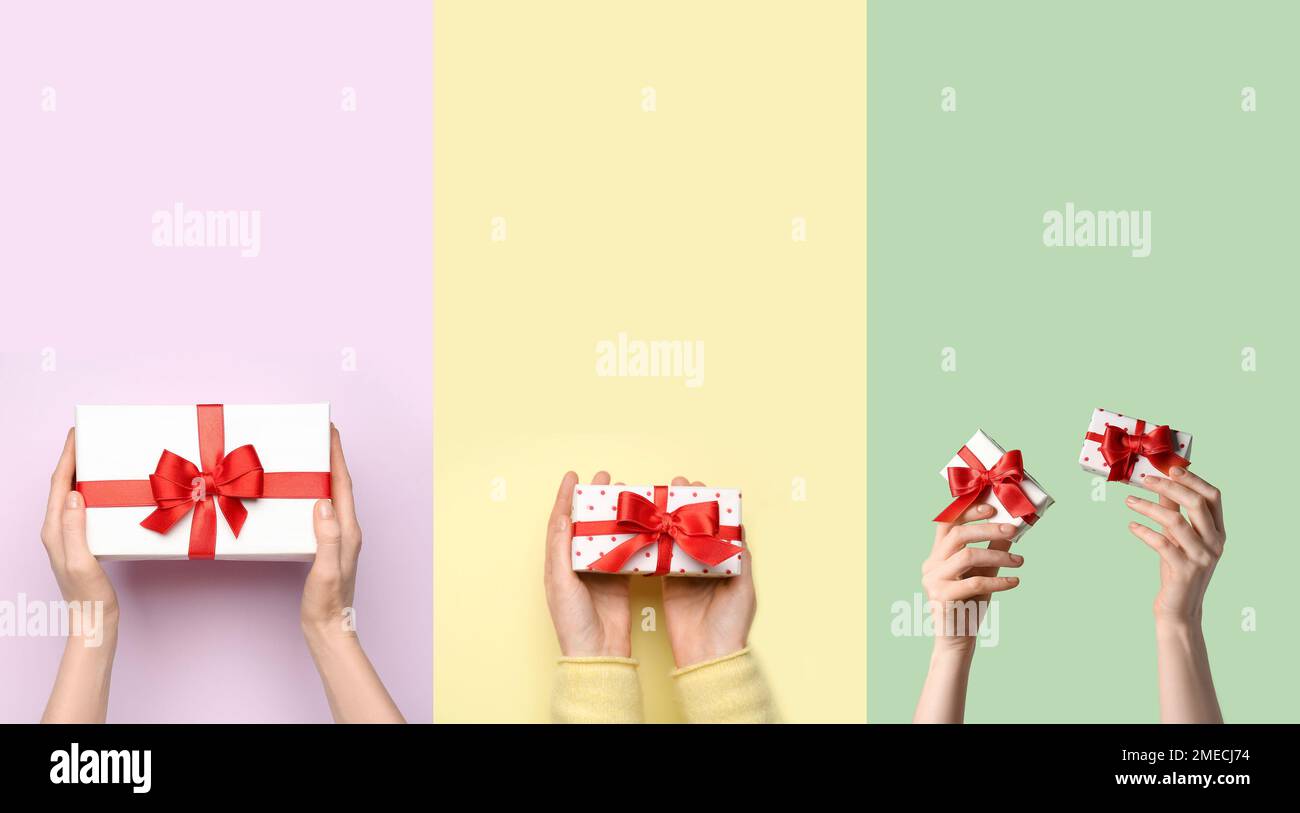 Hands holding gift boxes hi-res stock photography and images - Alamy
