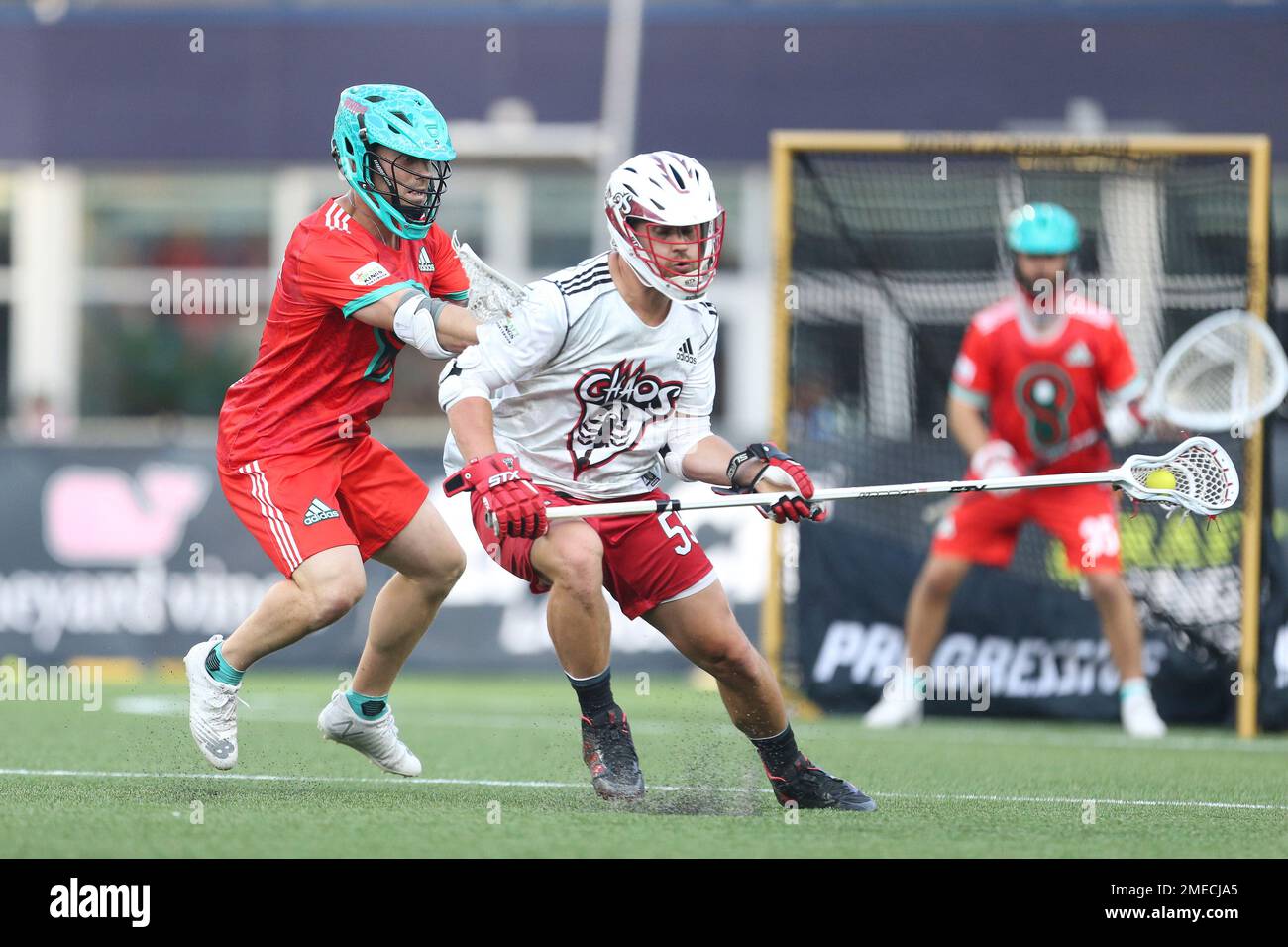 Whipsnakes' Michael Ehrhardt (28) defends against Chaos' Ian MacKay (55 ...