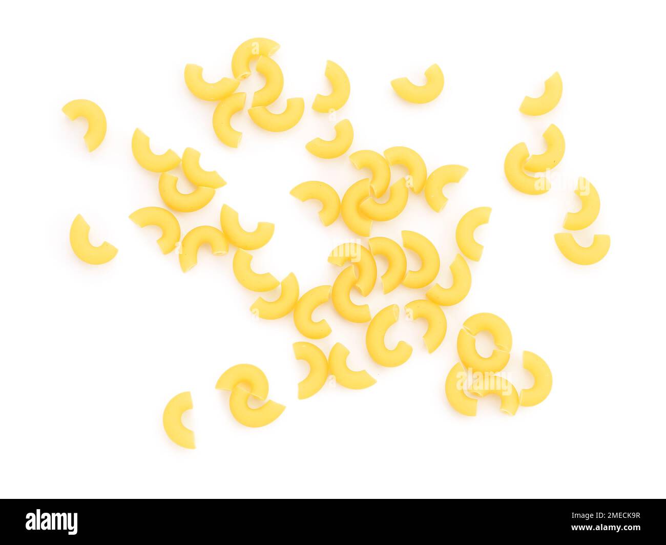Raw elbow pasta on white background Stock Photo - Alamy