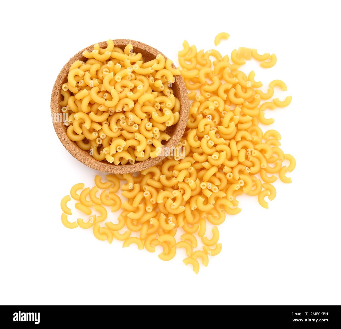 Plate of raw elbow pasta on white background Stock Photo - Alamy