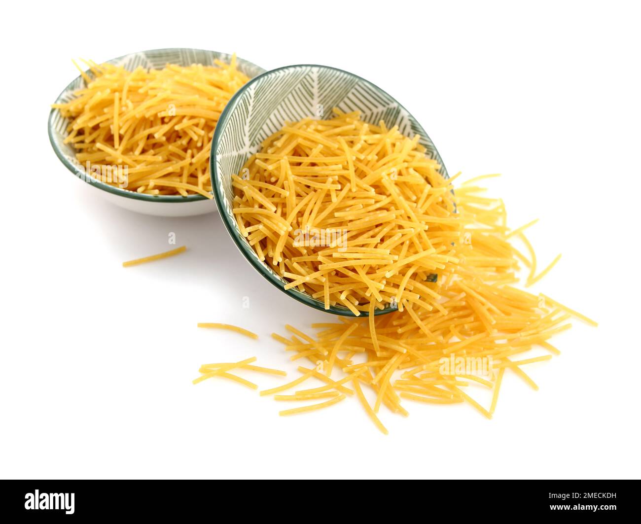 Bowls of raw vermicelli pasta on white background Stock Photo - Alamy