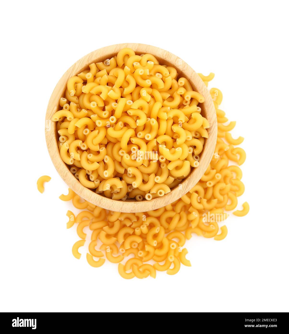 Wooden bowl of uncooked elbow pasta isolated on white background Stock ...