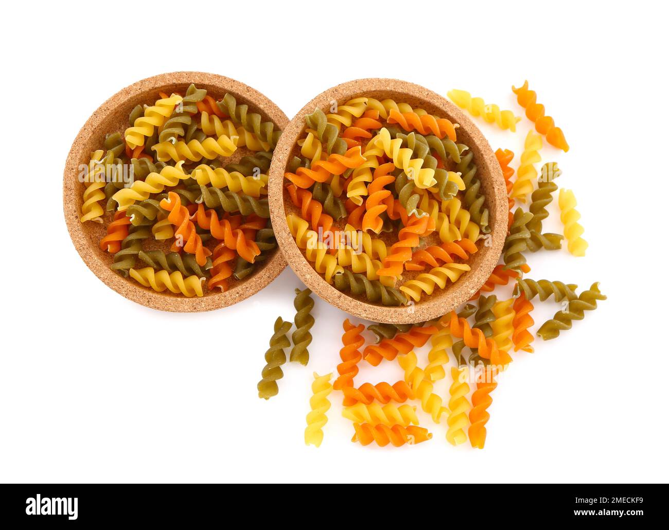 Plates of raw fusilli pasta isolated on white background Stock Photo ...