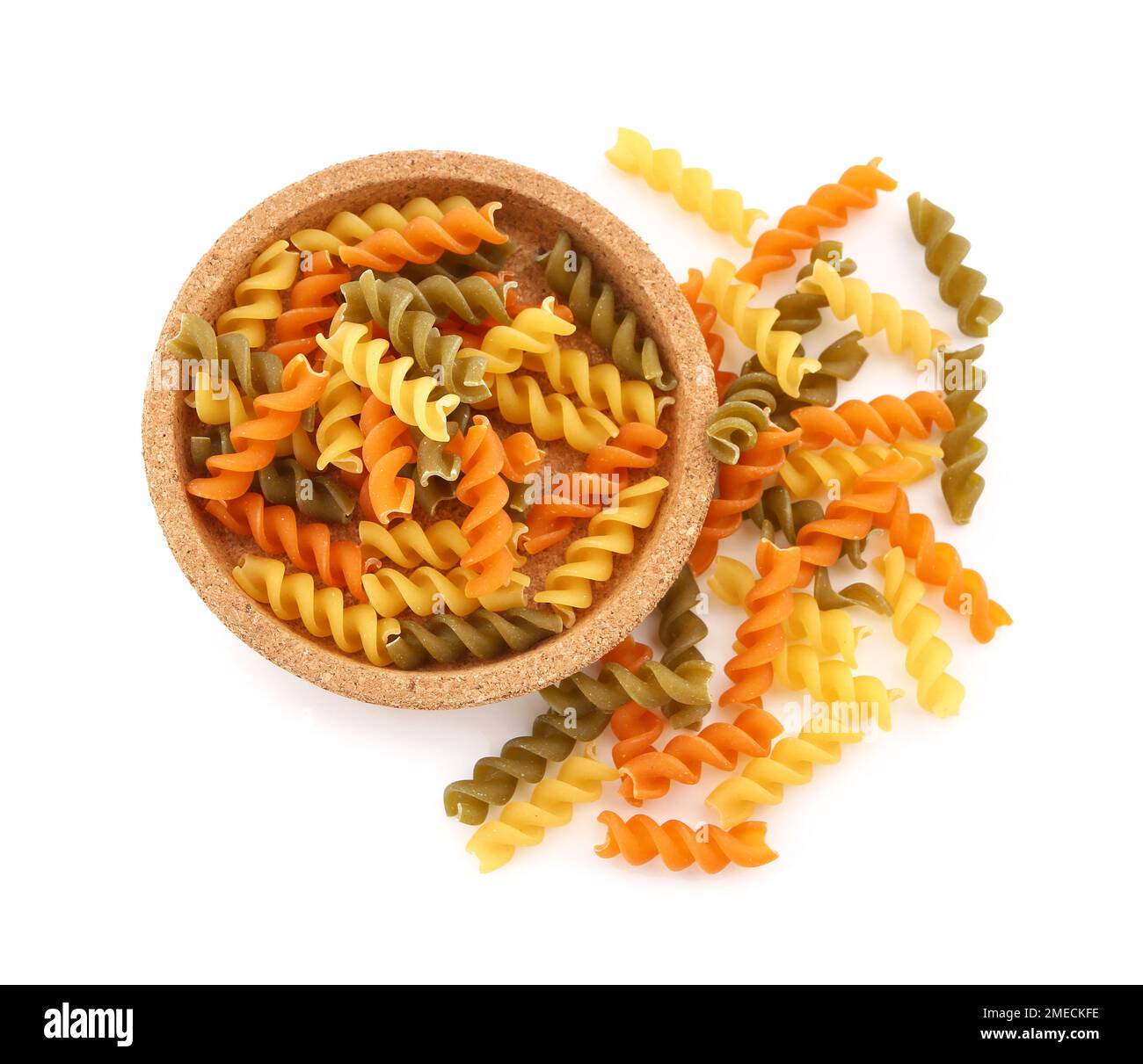 Plate of raw fusilli pasta isolated on white background Stock Photo - Alamy