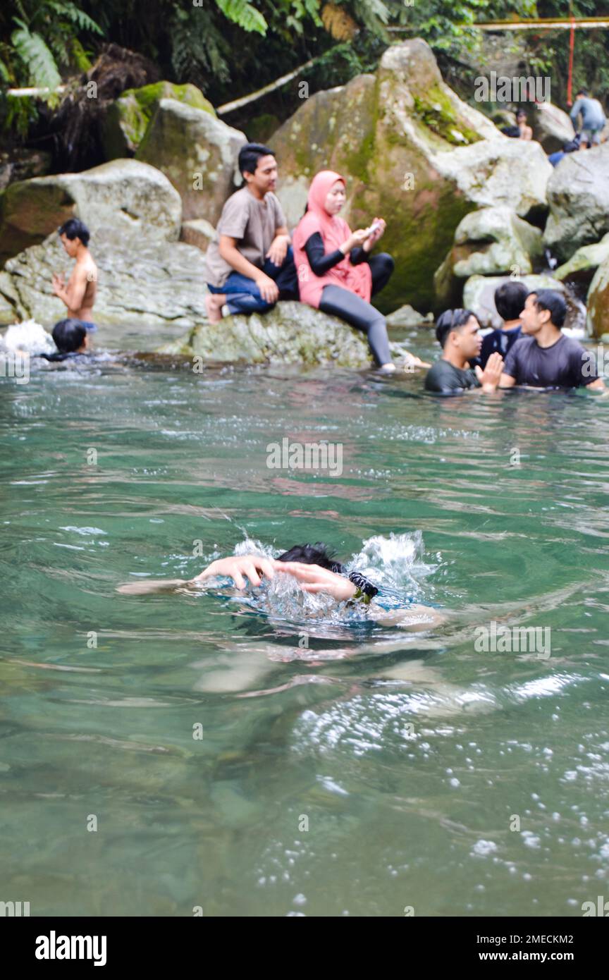 Swimming, Playing In The Water And Enjoying The Natural Beauty Of The ...