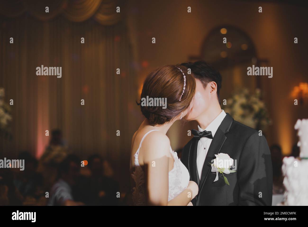 Bride and Groom Backs hugging and kissing couple no faces Stock Photo ...