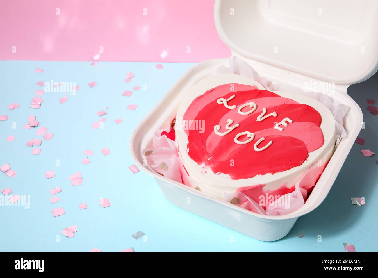 Lunch box with heart-shaped bento cake and confetti for Valentine's Day ...