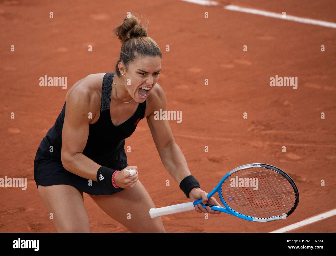 Maria Sakkari of Greece celebrates after defeating Belgium's Elise ...