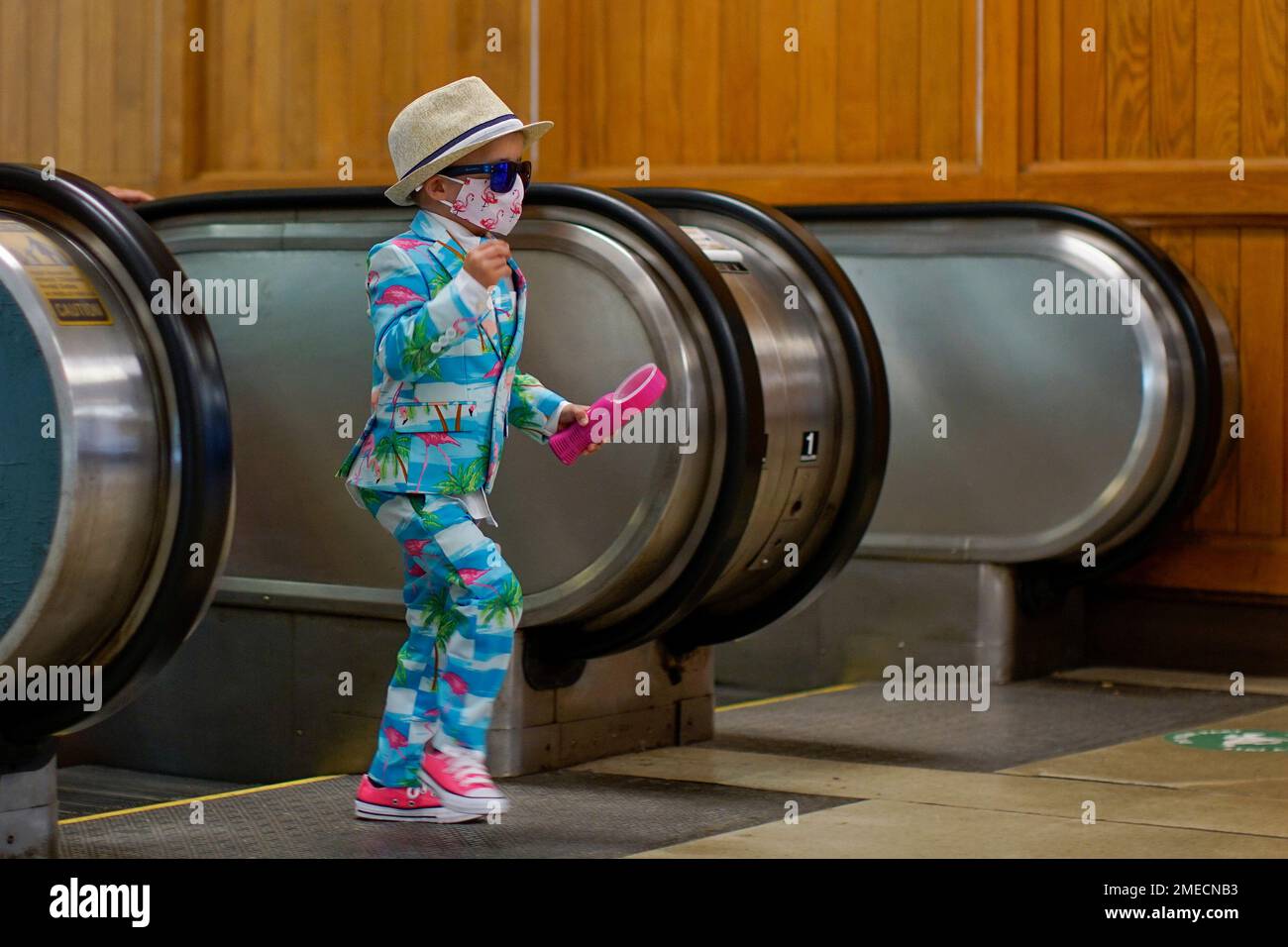 A young horse racing fan arrives at Belmont Park for the 153rd running ...