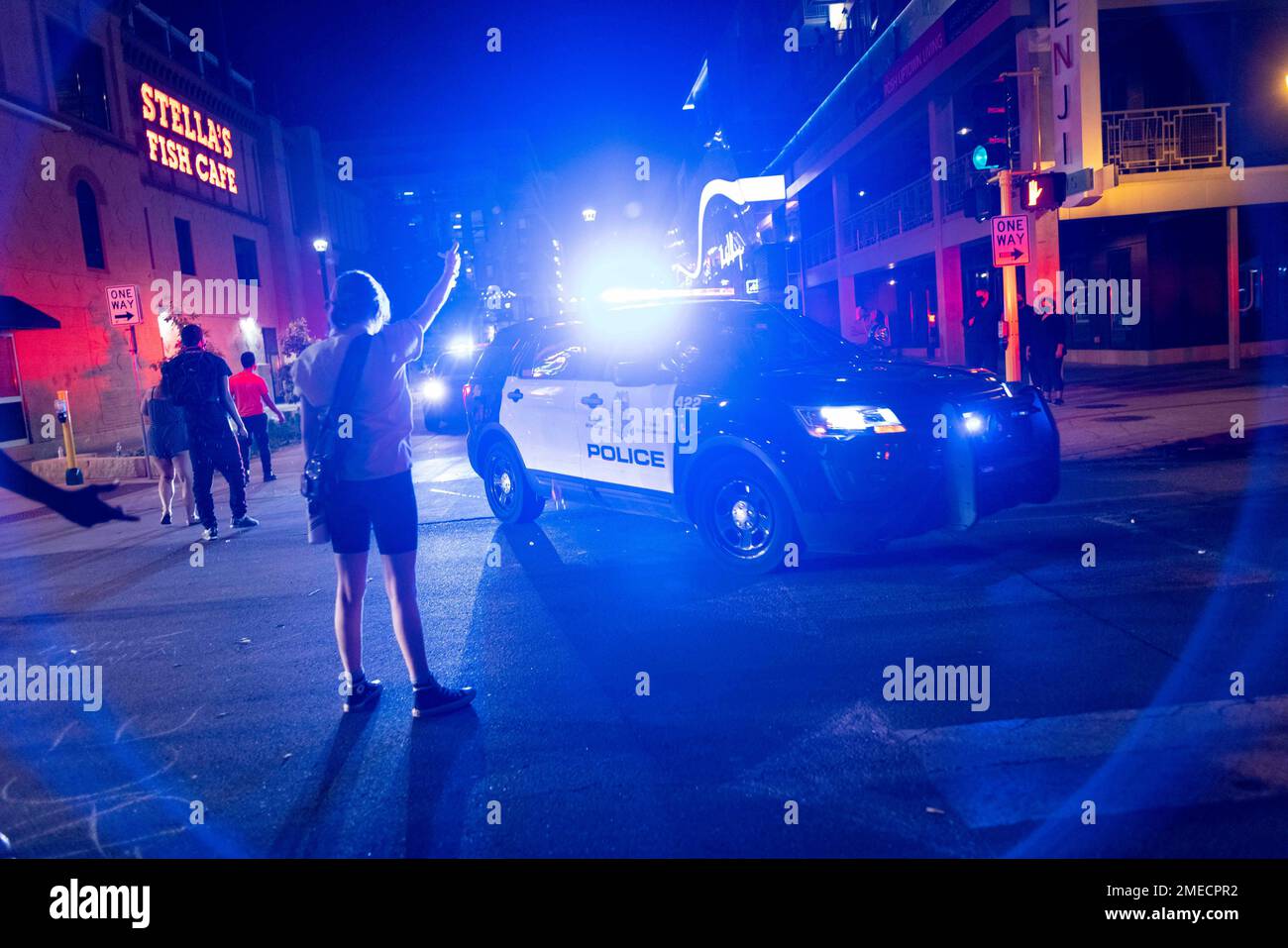 Protesters clash with police after a vigil held for Winston Boogie ...