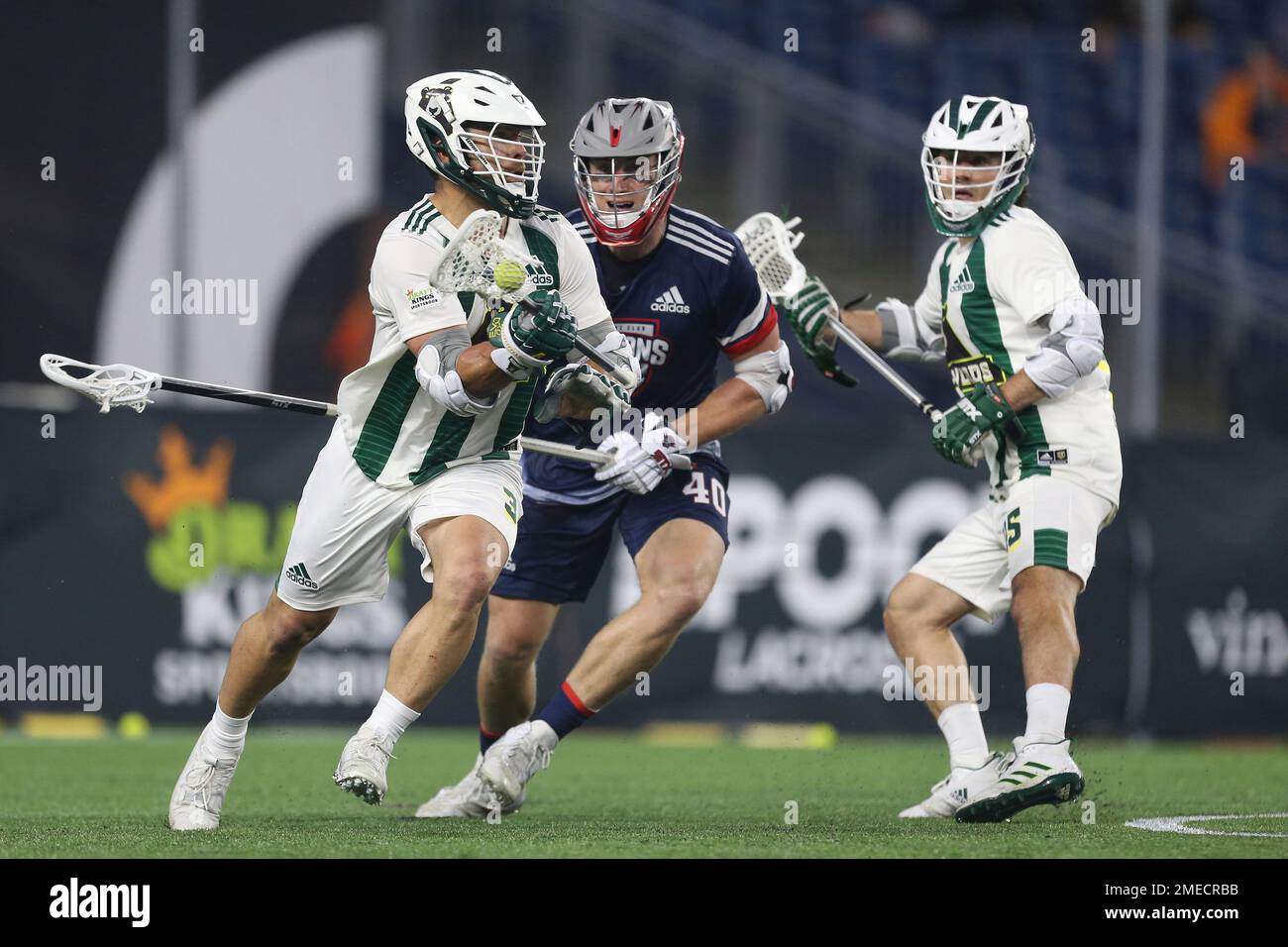 Redwoods' Rob Pannell (3) holds the ball against Cannons' Jack Kielty ...