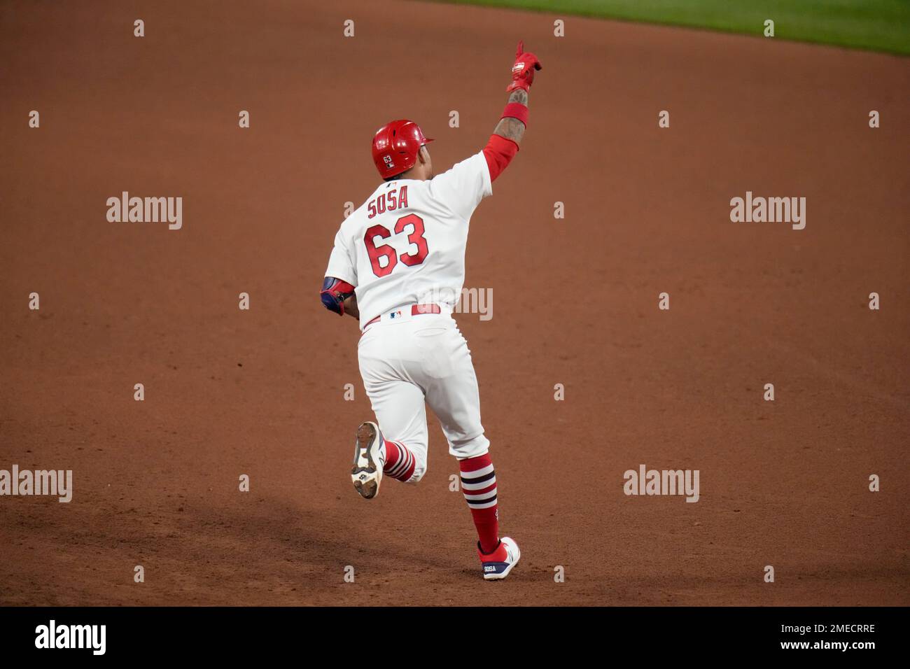 St. Louis Cardinals' Edmundo Sosa rounds the bases after hitting his ...