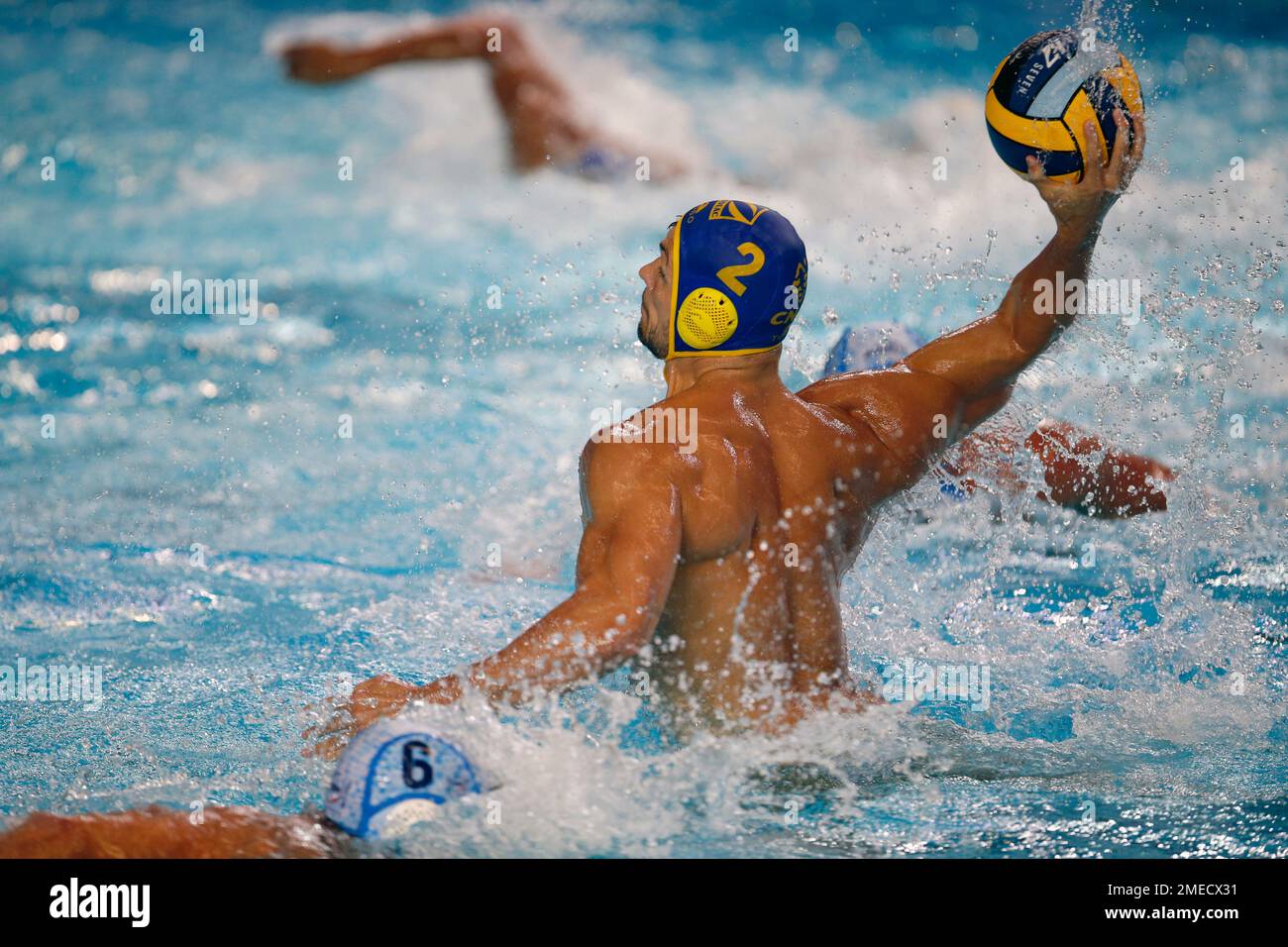Martin Famera of Barceloneta, center, shoots and scores during their ...