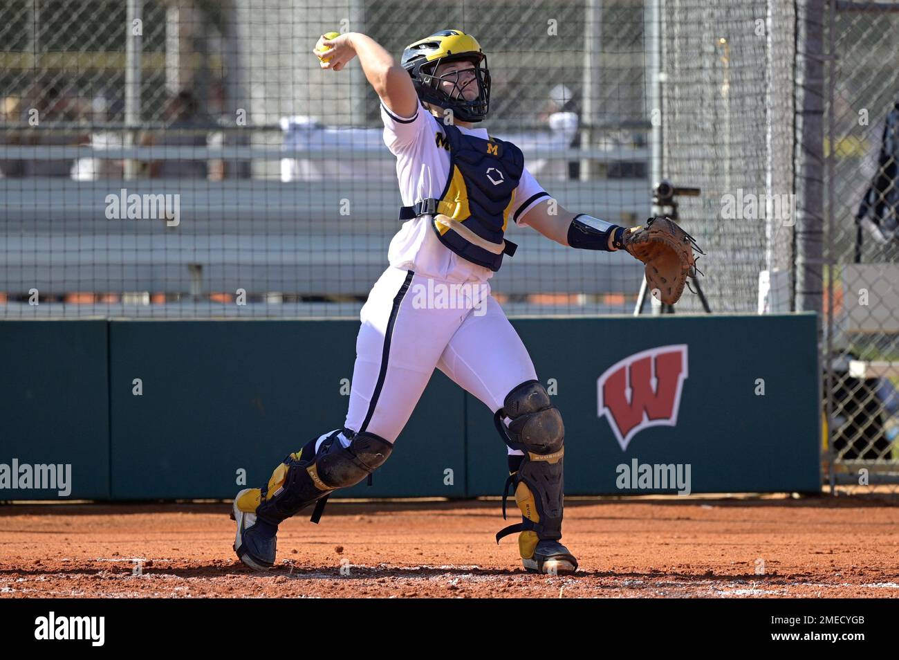 Michigan catcher Hannah Carson throws during an NCAA college softball ...