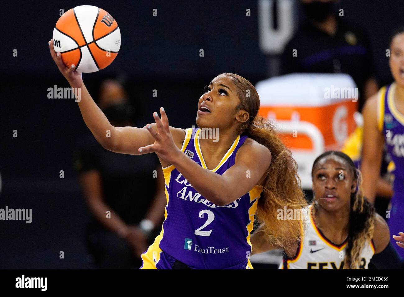 Los Angeles Sparks guard Te'a Cooper, left, shoots as Indiana Fever ...