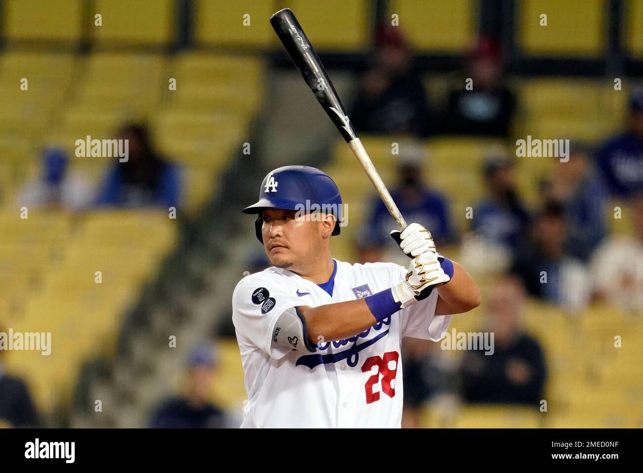 Los Angeles Dodgers' Yoshi Tsutsugo bats during a baseball game against ...