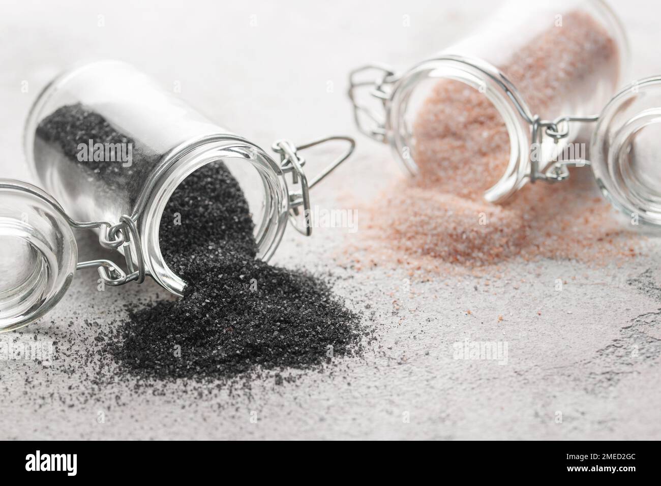 Jars of Hawaiian black lava sea salt and himalayan pink salt. Healthy ...