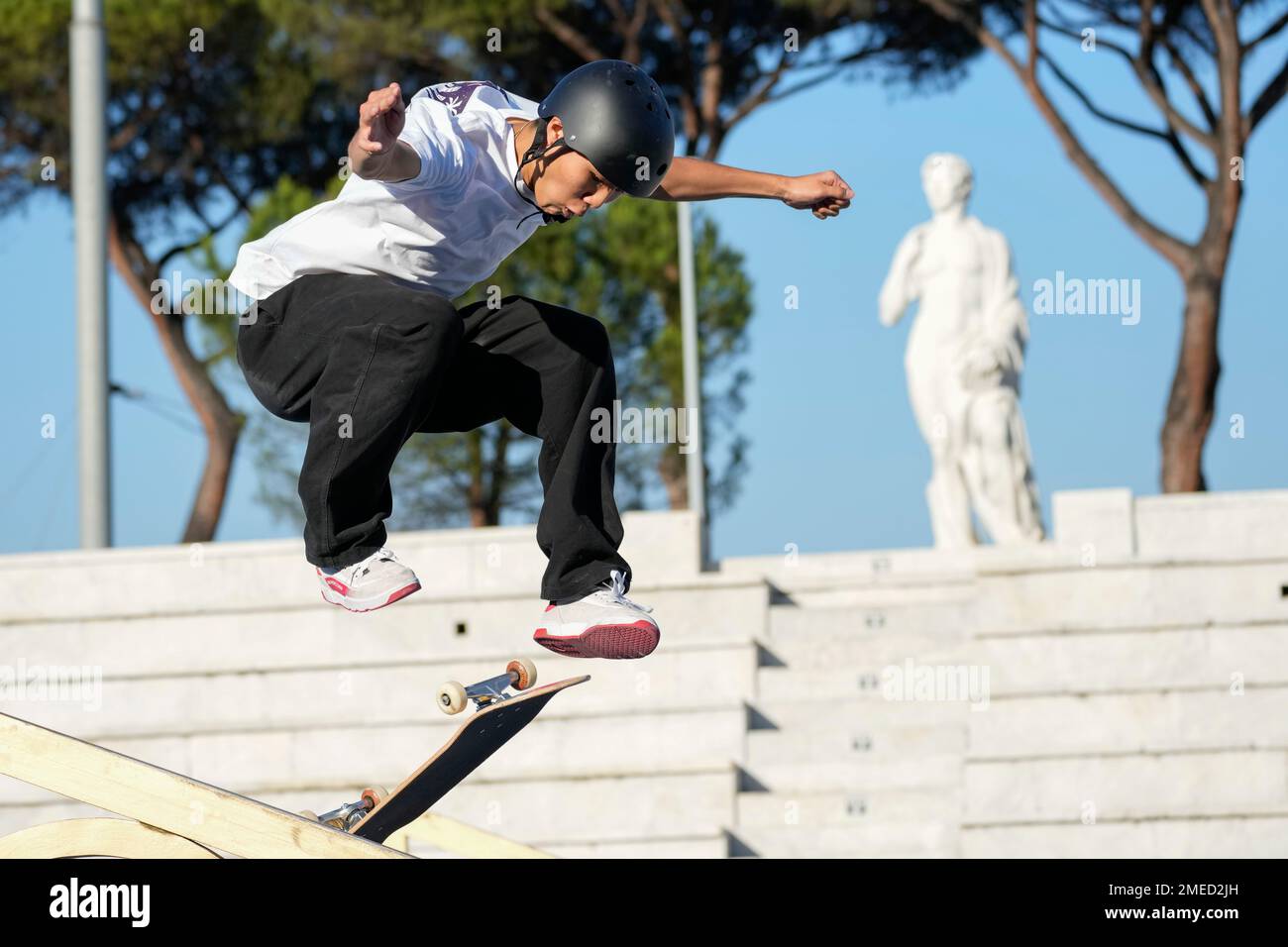 Yukito Aoki of Japan competes in the Street Skateboarding World ...
