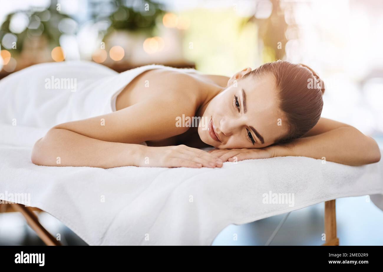 Woman laid on bed relaxing hi-res stock photography and images - Alamy