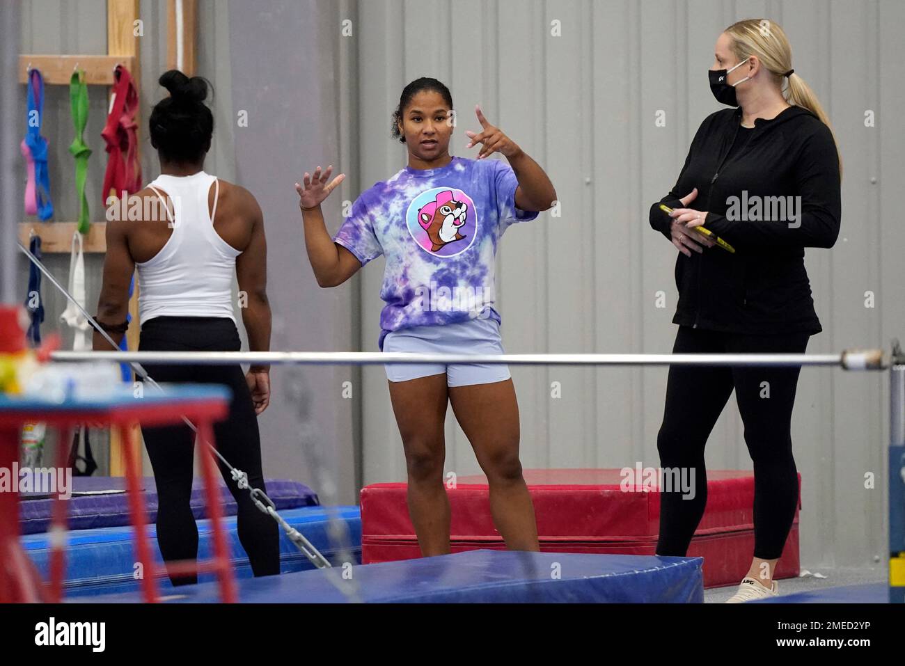 FILE - In this May 11, 2021, file photos, gymnast Jordan Chiles, center ...