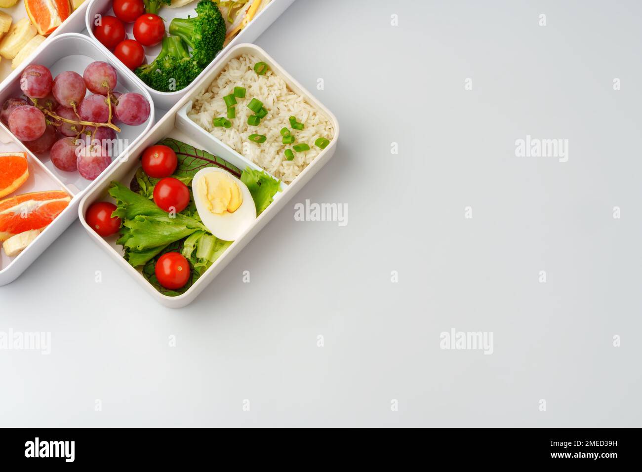 Healthy food delivery in take away box on white background Stock Photo ...