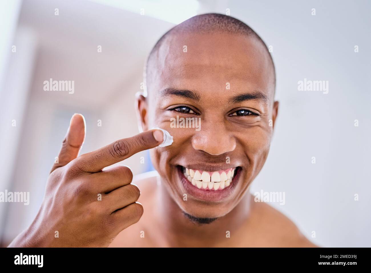 My best weapon for fighting the signs of aging. a handsome young man ...