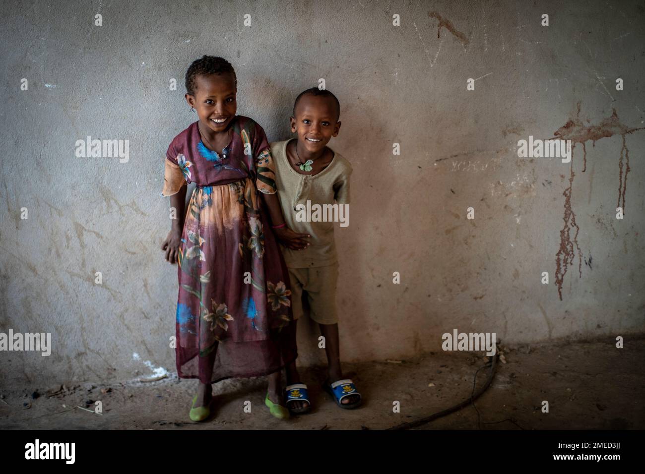 Young Tigrayan children stand in a corridor at an elementary school ...