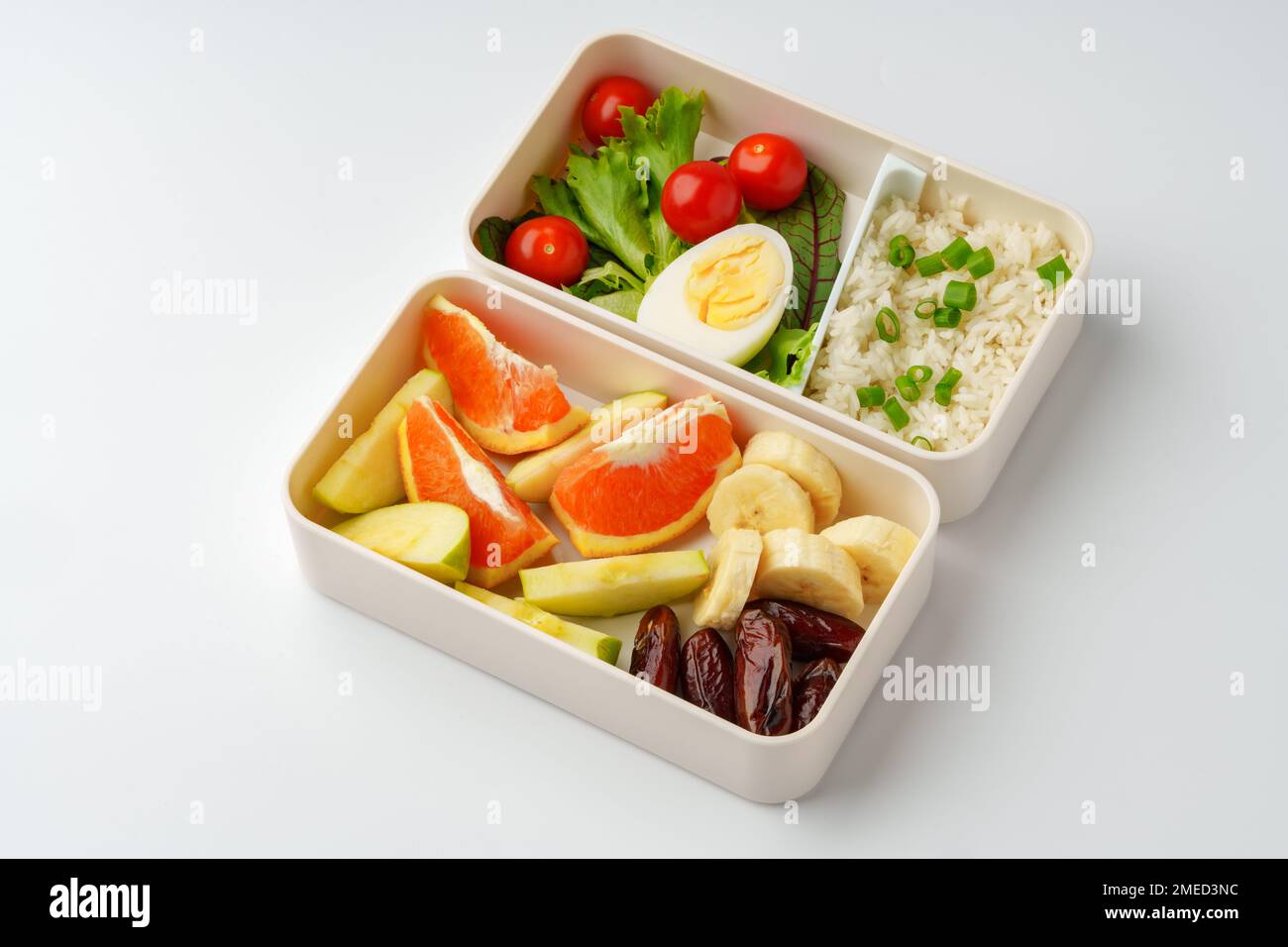Lunch boxes with healthy food isolated on white Stock Photo - Alamy