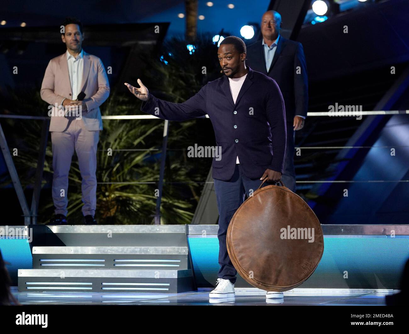 Anthony Mackie speaks as Paul Rudd, left, and Disney CEO Bob Chapek ...